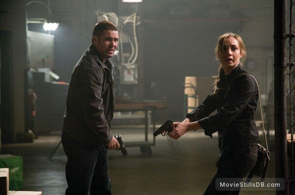 Alien Raiders - Publicity still of Carlos Bernard & Courtney Ford