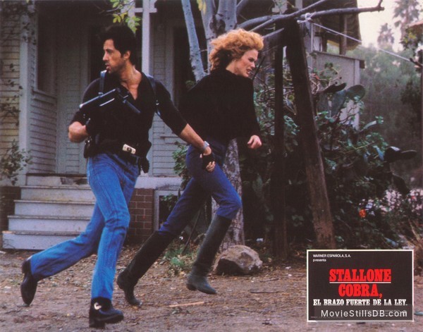 Cobra - Lobby card with Sylvester Stallone & Brigitte Nielsen